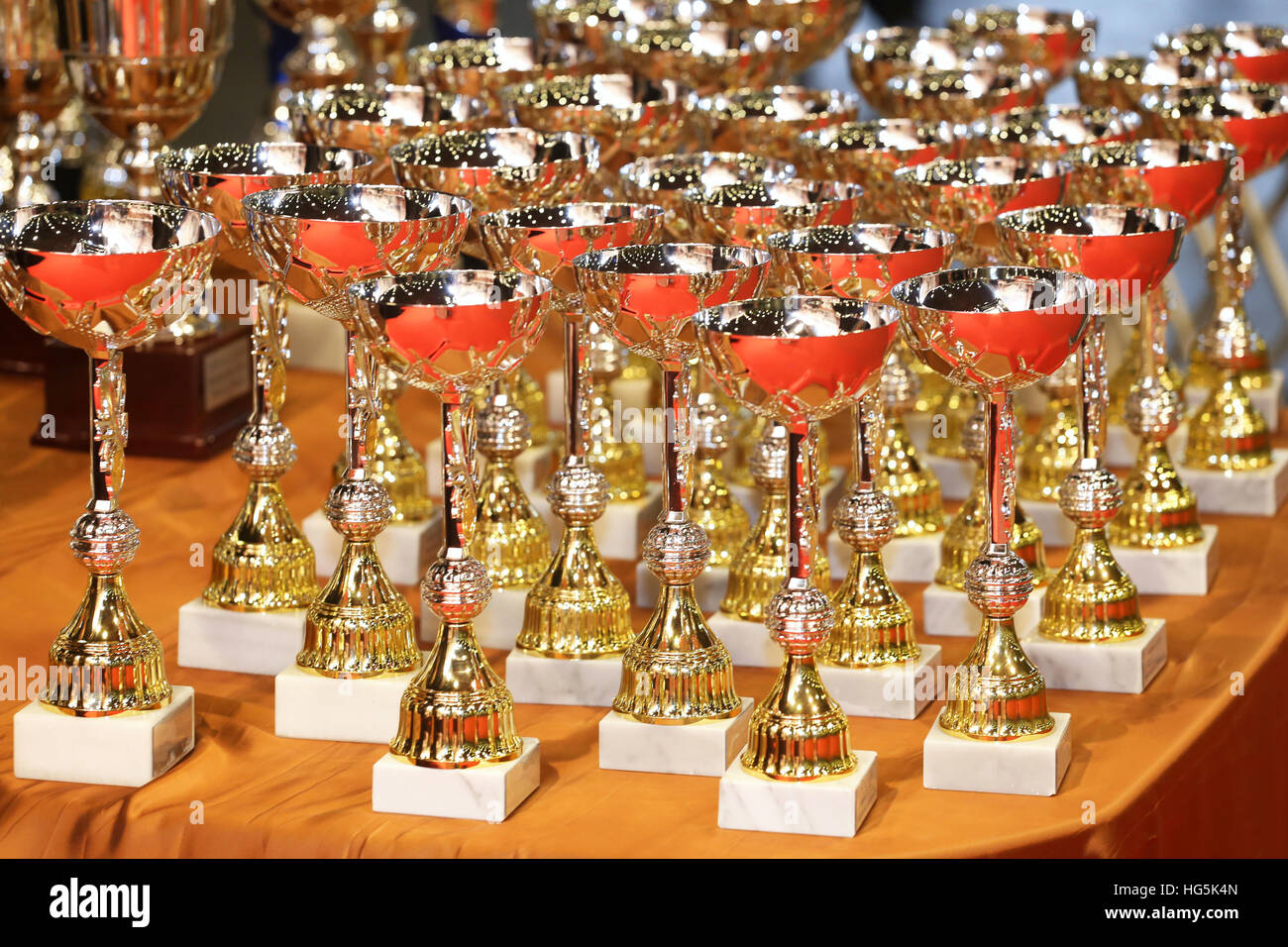 Award trophies awarding of winners as a background Stock Photo - Alamy