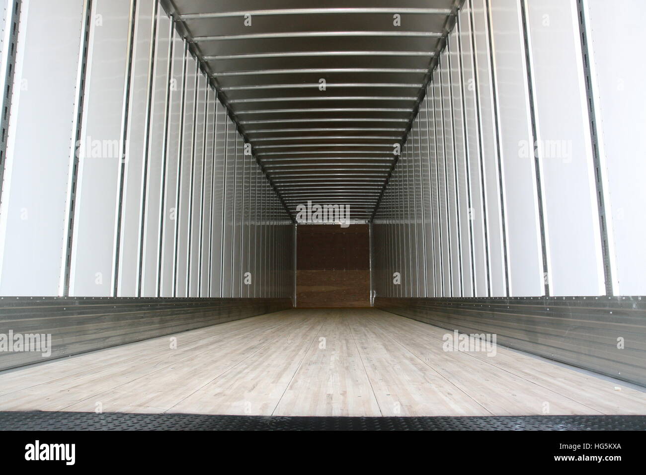 Big trailer container empty ready to be loaded Stock Photo - Alamy
