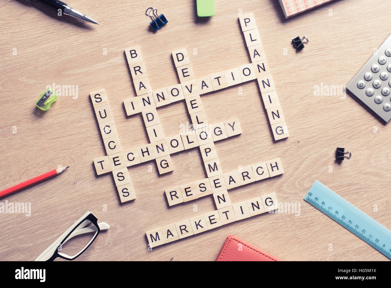 Conceptual media keywords on table with elements of game making Stock ...