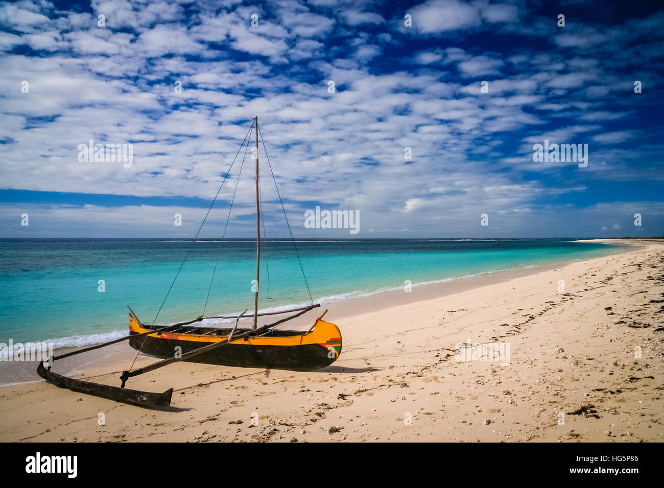 Small traditional pirogue on the shore of Nosy Ve island in Madagascar ...