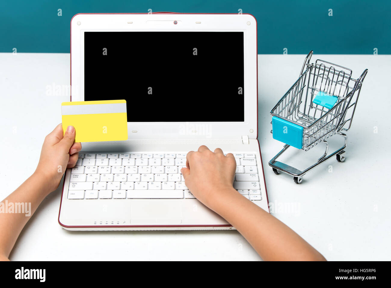 Using laptop to online shopping and pay by credit card. Vintage tone ...
