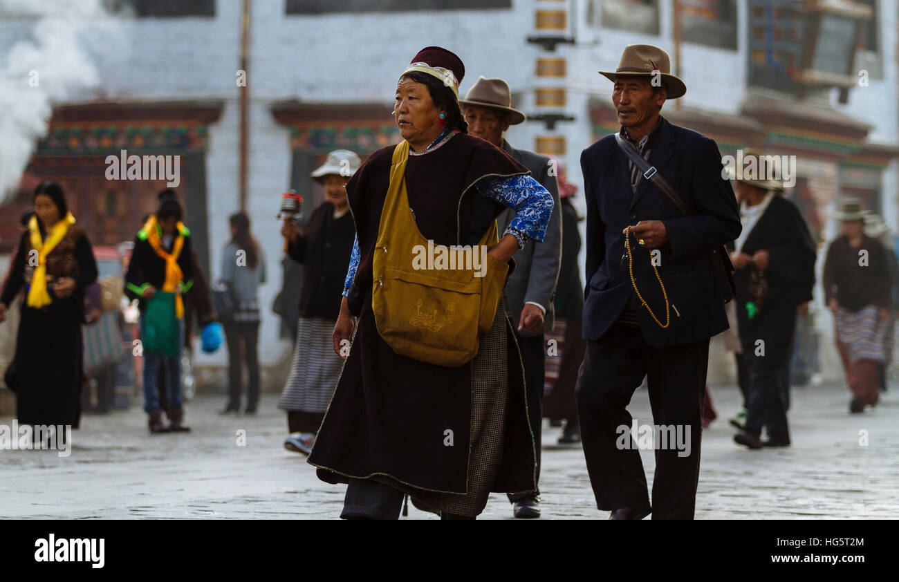 Lhasa, Tibet - The view of many Pilgrims at the Jokhang Temple Square ...