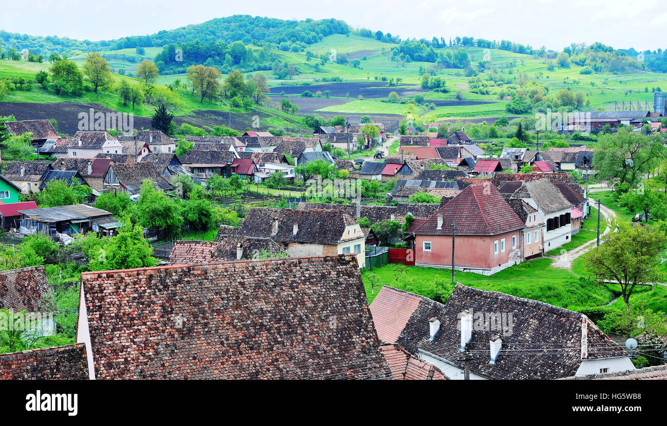 Traditional romanian houses in Biertan town on summer Stock Photo - Alamy