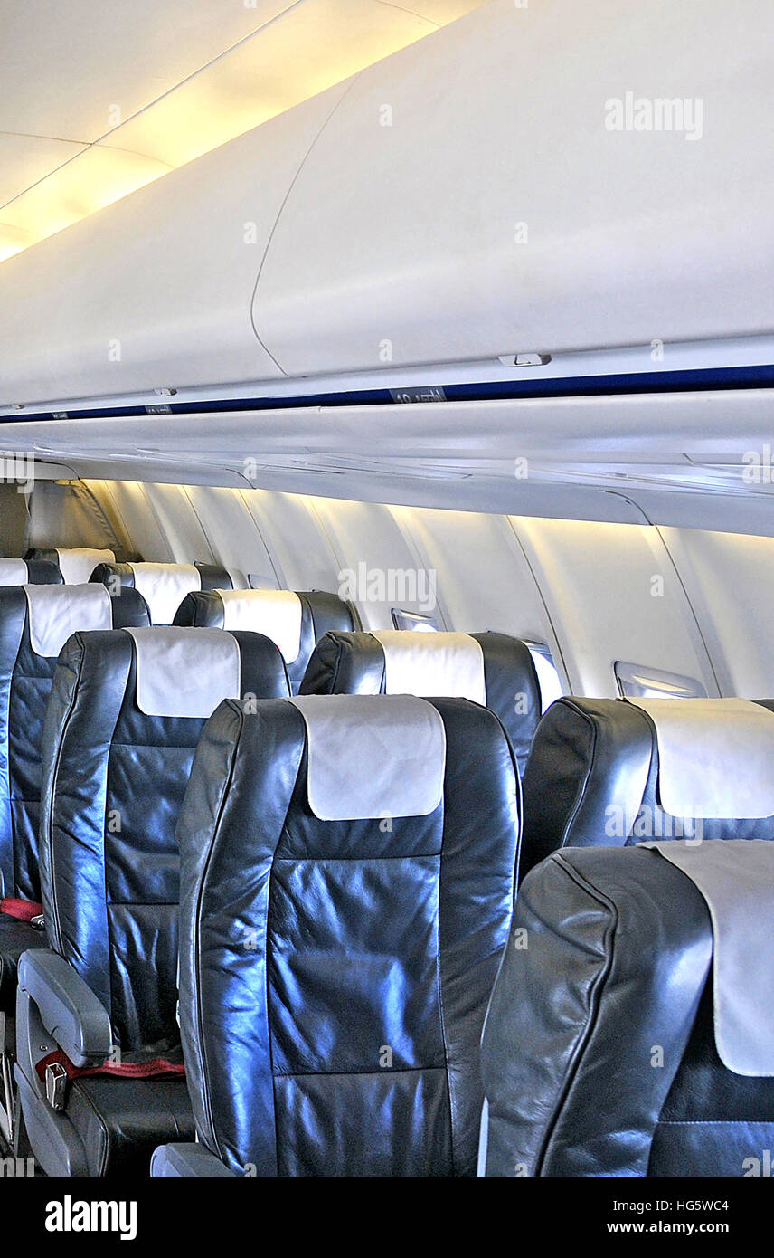 Airplane luggage rack hi-res stock photography and images - Alamy