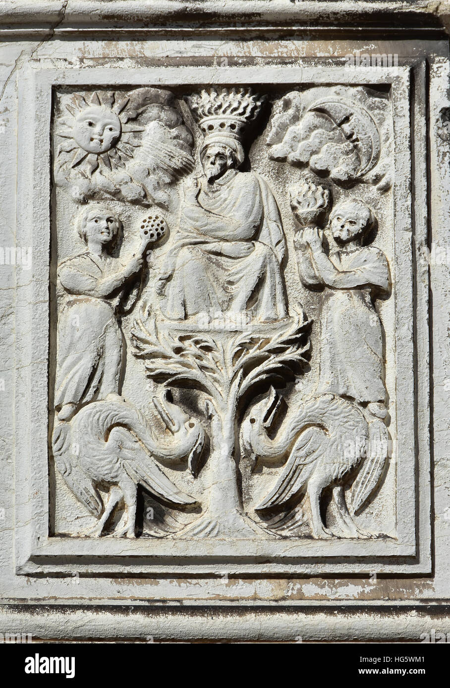 Ancient relief of God or deity between Sun and Moon on a Venice wall ...