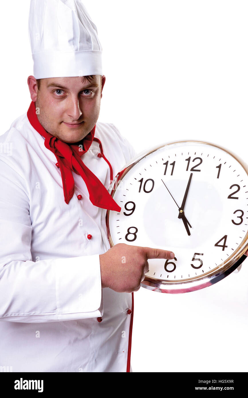 Chef holding a wall clock Stock Photo - Alamy