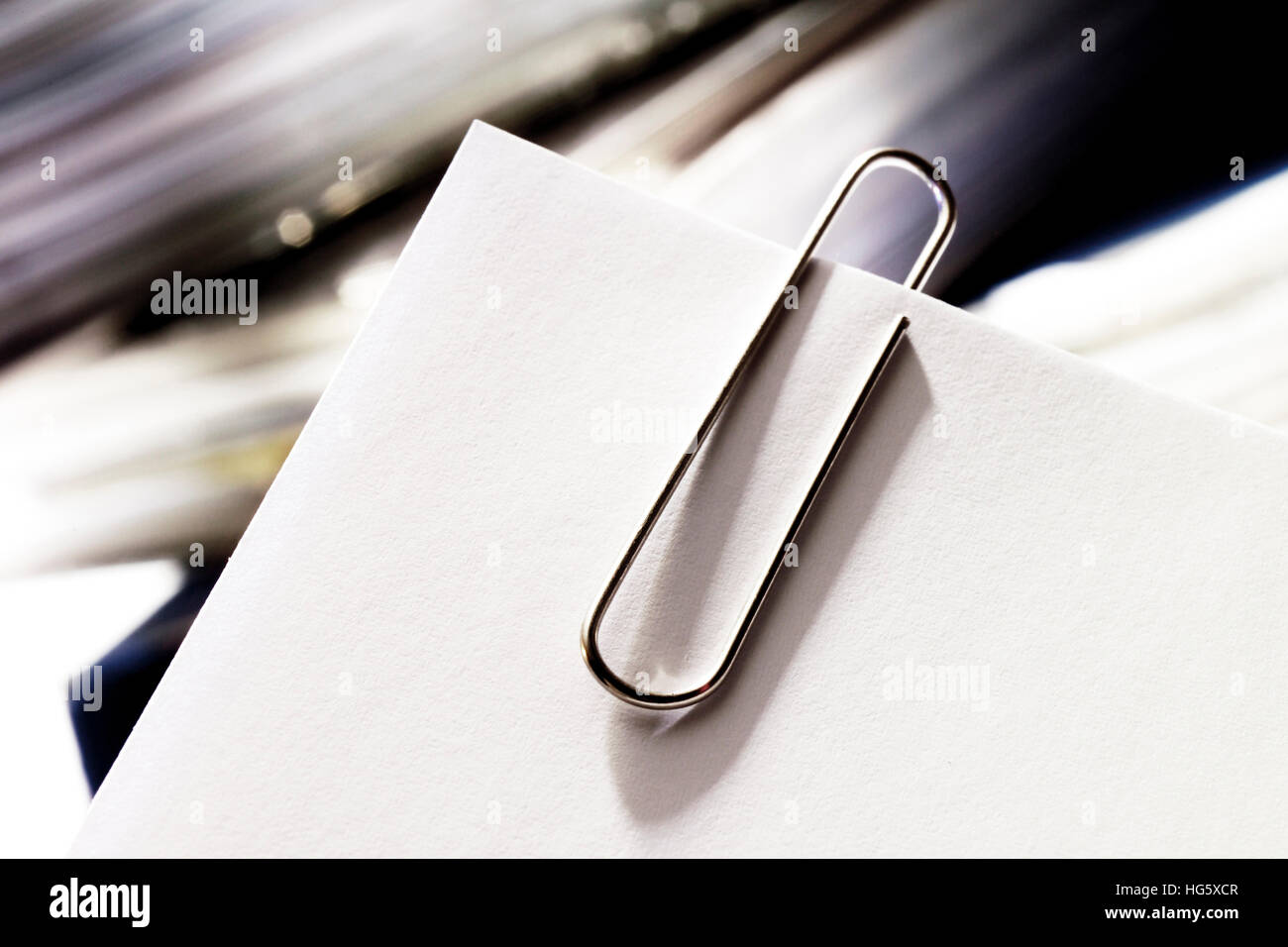 Paper clip attached to letterhead Stock Photo - Alamy