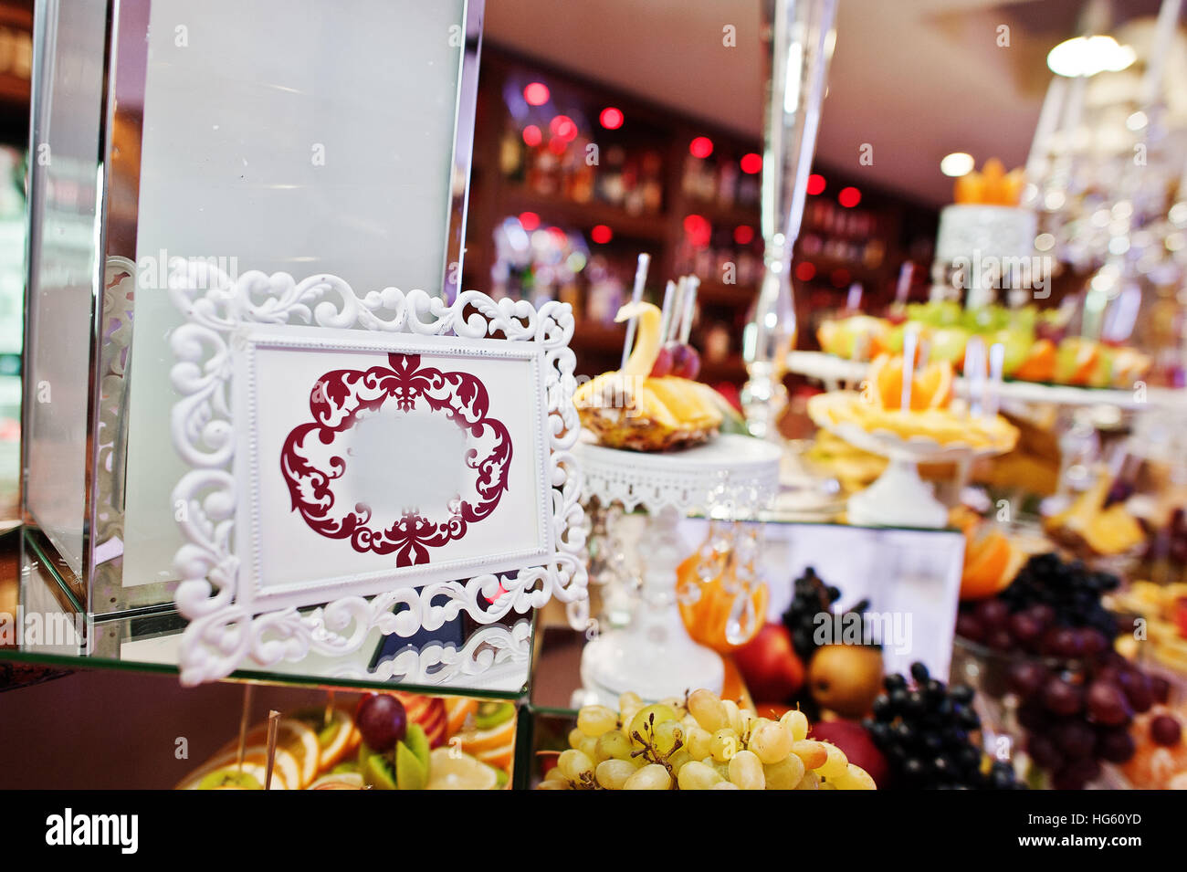Frame with red pattern on wedding reception Stock Photo - Alamy