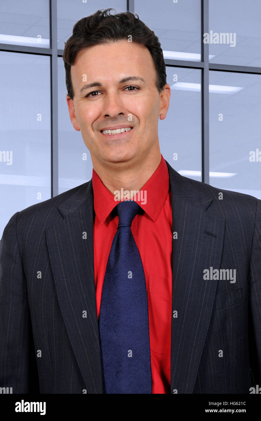 Handsome business man wearing a formal suit Stock Photo - Alamy