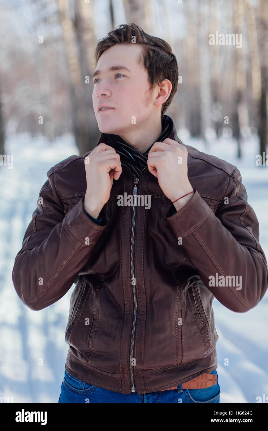 Man's handsome face with style hair in winter sunny day Stock Photo - Alamy