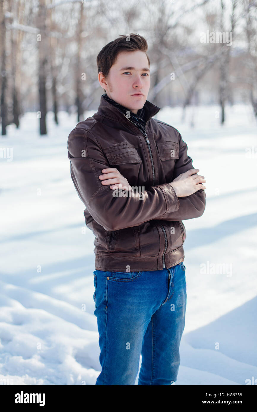 Man's handsome face with style hair in winter sunny day Stock Photo - Alamy