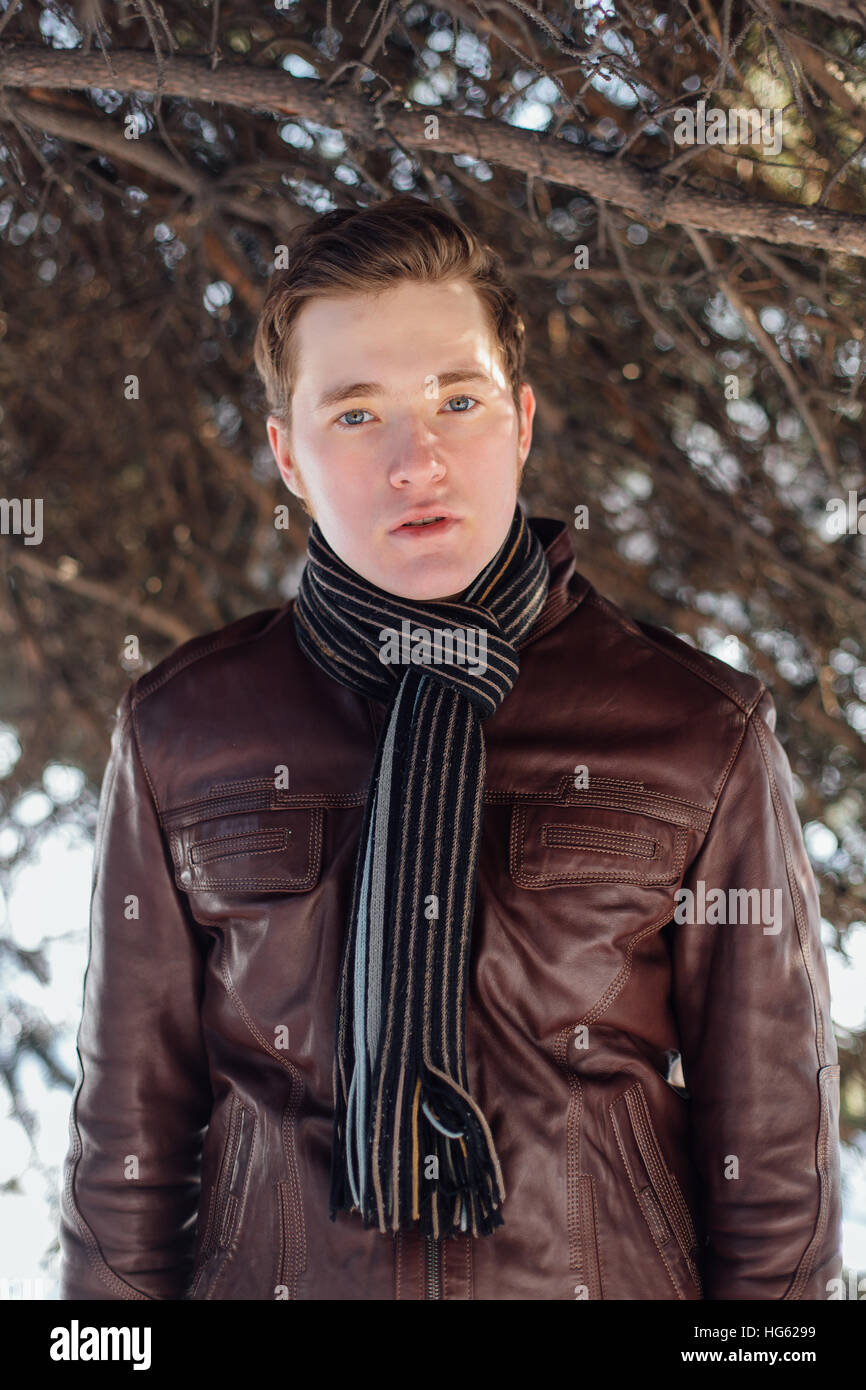 Man's handsome face with style hair in winter sunny day Stock Photo - Alamy
