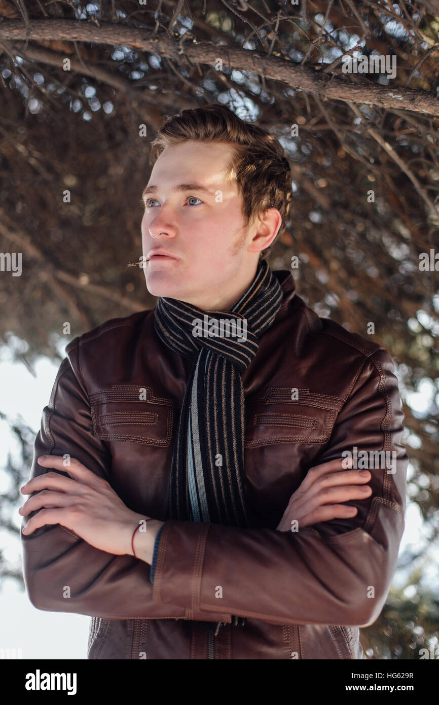 Man's handsome face with style hair in winter sunny day Stock Photo - Alamy