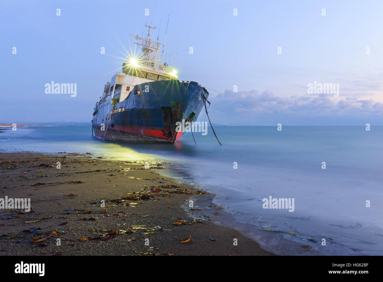Aground scientific ship is waiting for rescue, Sakhalin island, Russia ...