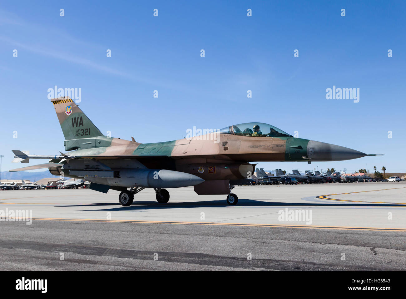 An aggressor F-16 Fighting Falcon of the U.S. Air Force at Nellis Air ...