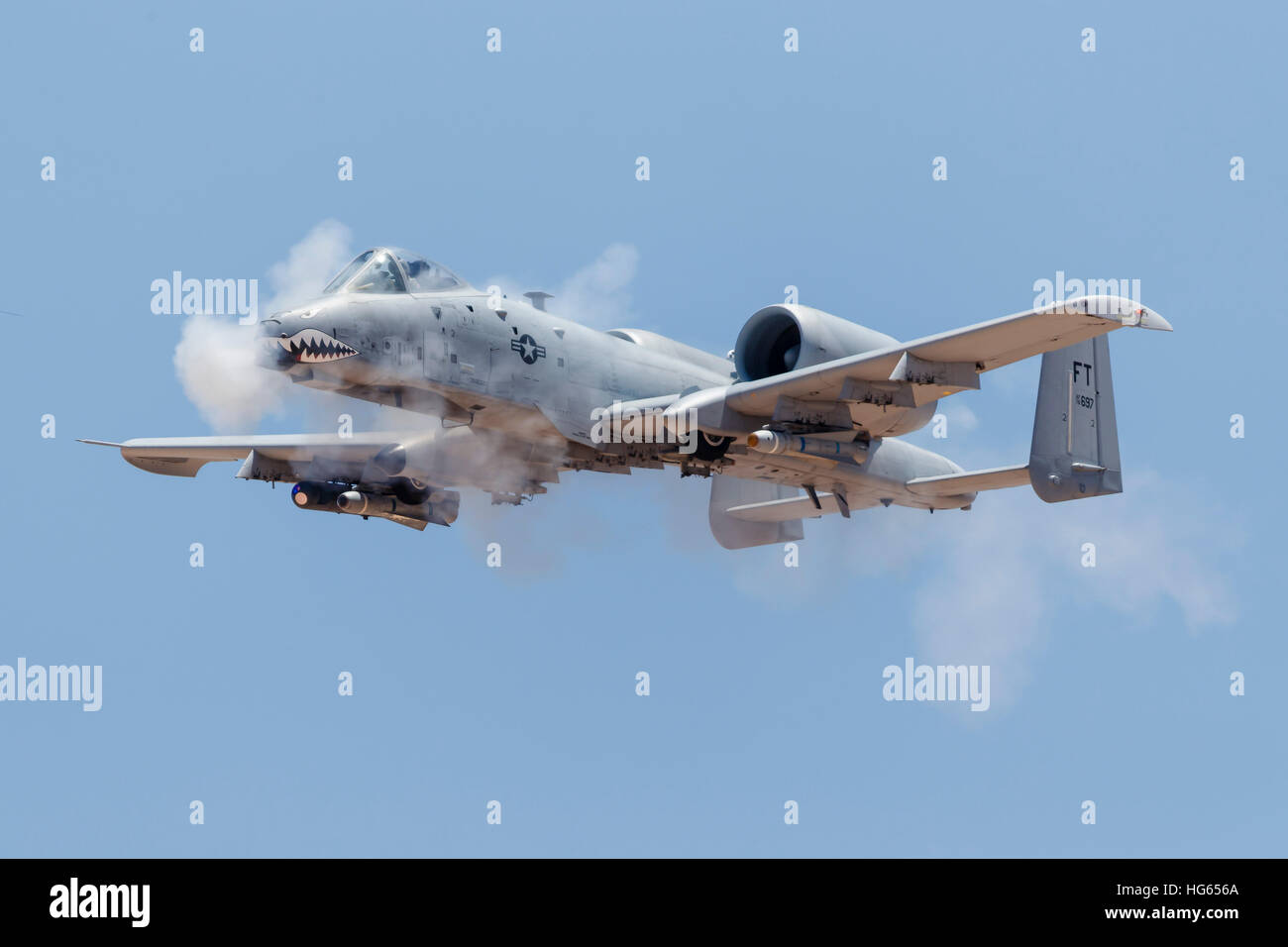 A U.S. Air Force A-10 Thunderbolt II fires its 30mm gun at a strafe ...