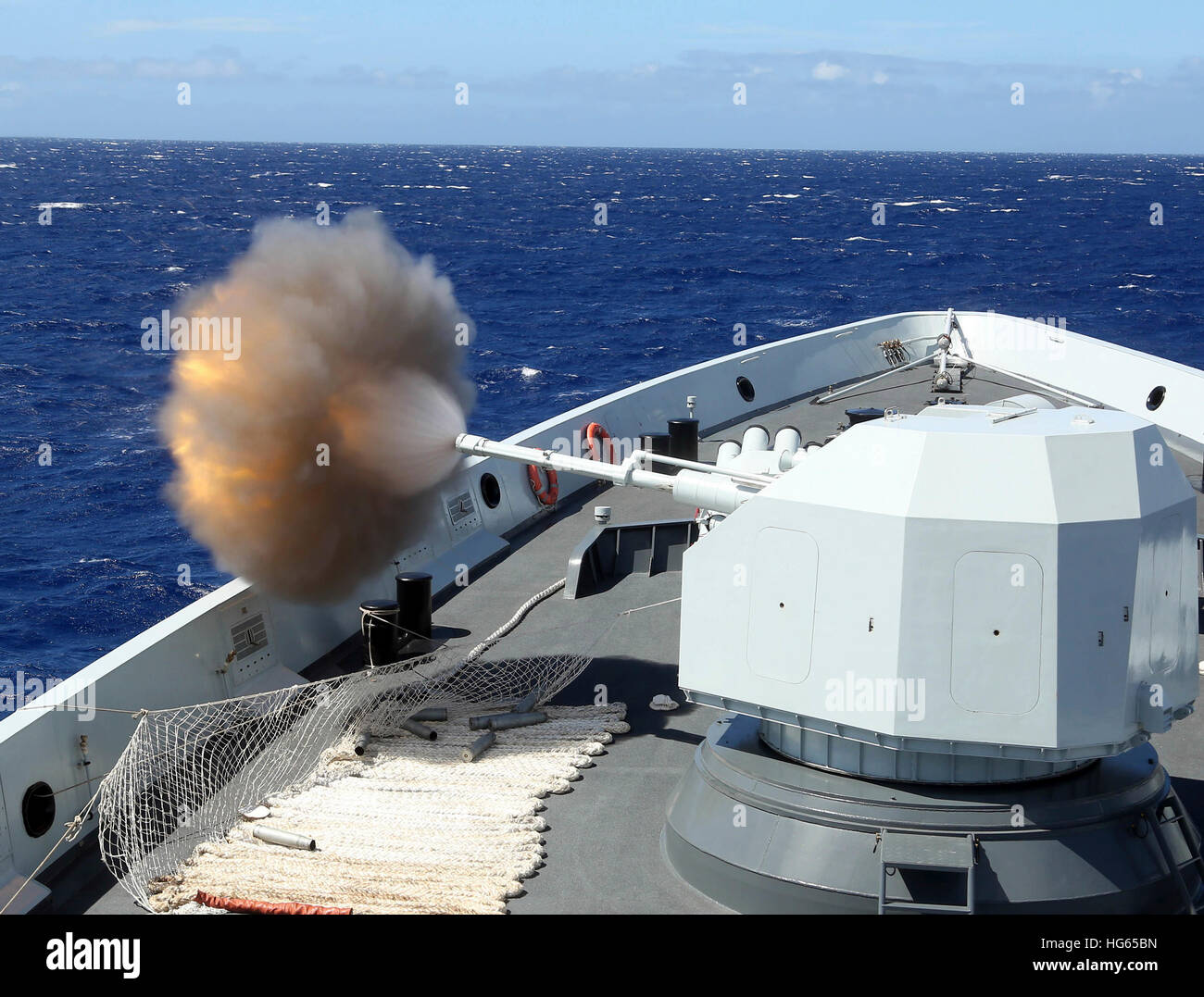 Chinese Navy multi-role frigate Hengshui fires its main gun Stock Photo ...