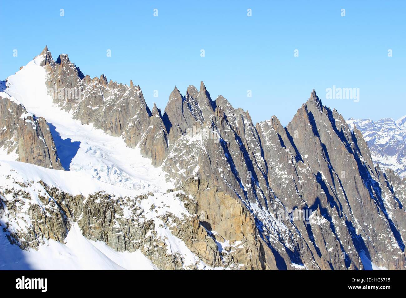 Alpine peaks under snow, winter scene Stock Photo - Alamy