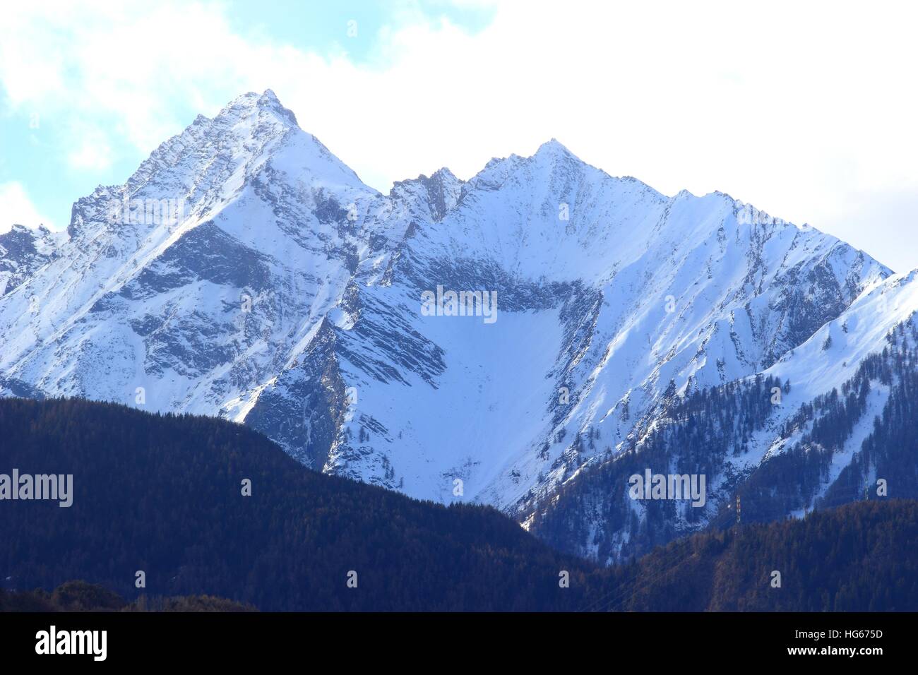 Alpine peaks under snow, winter scene Stock Photo - Alamy