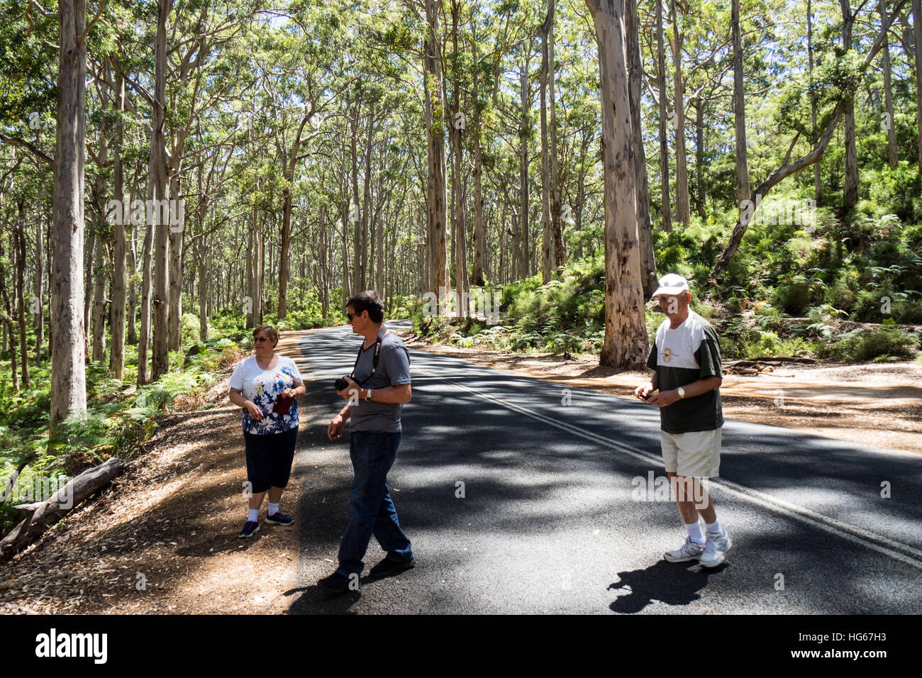 Three men crossing the road hi-res stock photography and images - Alamy