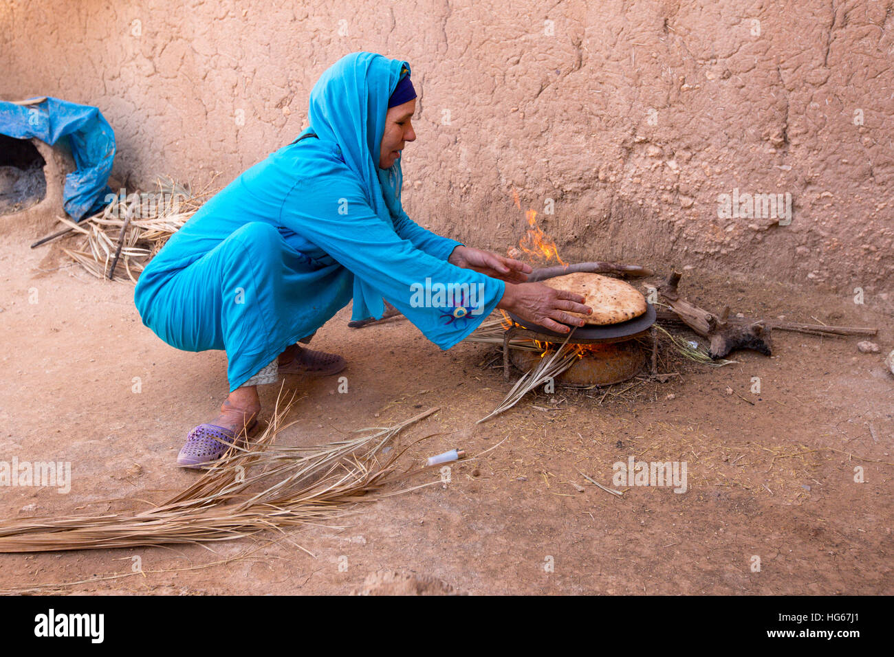 Ksar Elkhorbat, Morocco. Amazigh Berber Woman Baking Bread Stock Photo ...