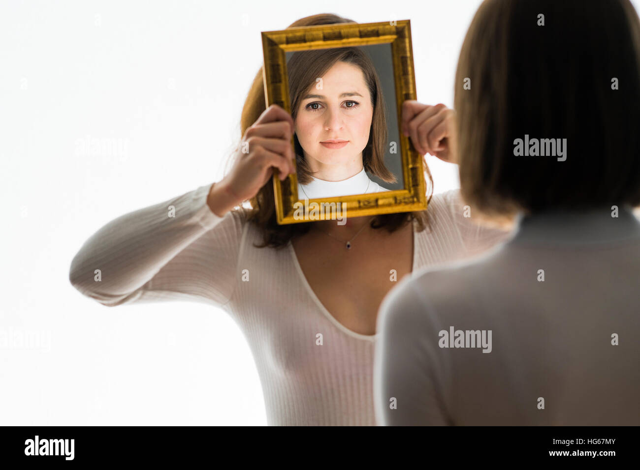 Doppelganger / Alter-ego themed photoshoot: a young woman girl looking ...