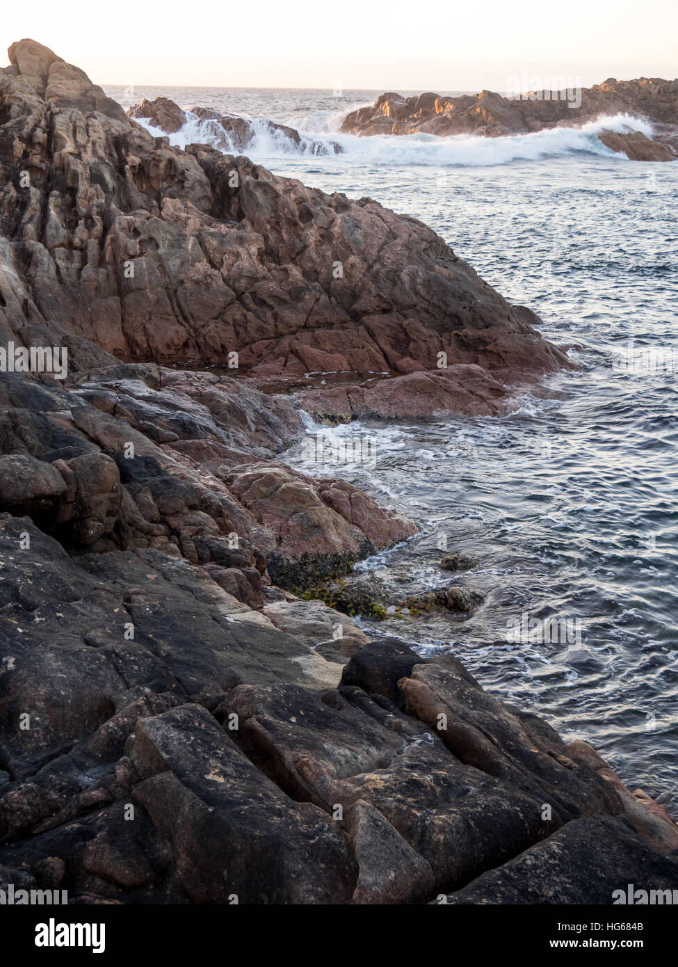 A rocky outcrop of weathered granite rock at Canal Rocks, Yallingup ...