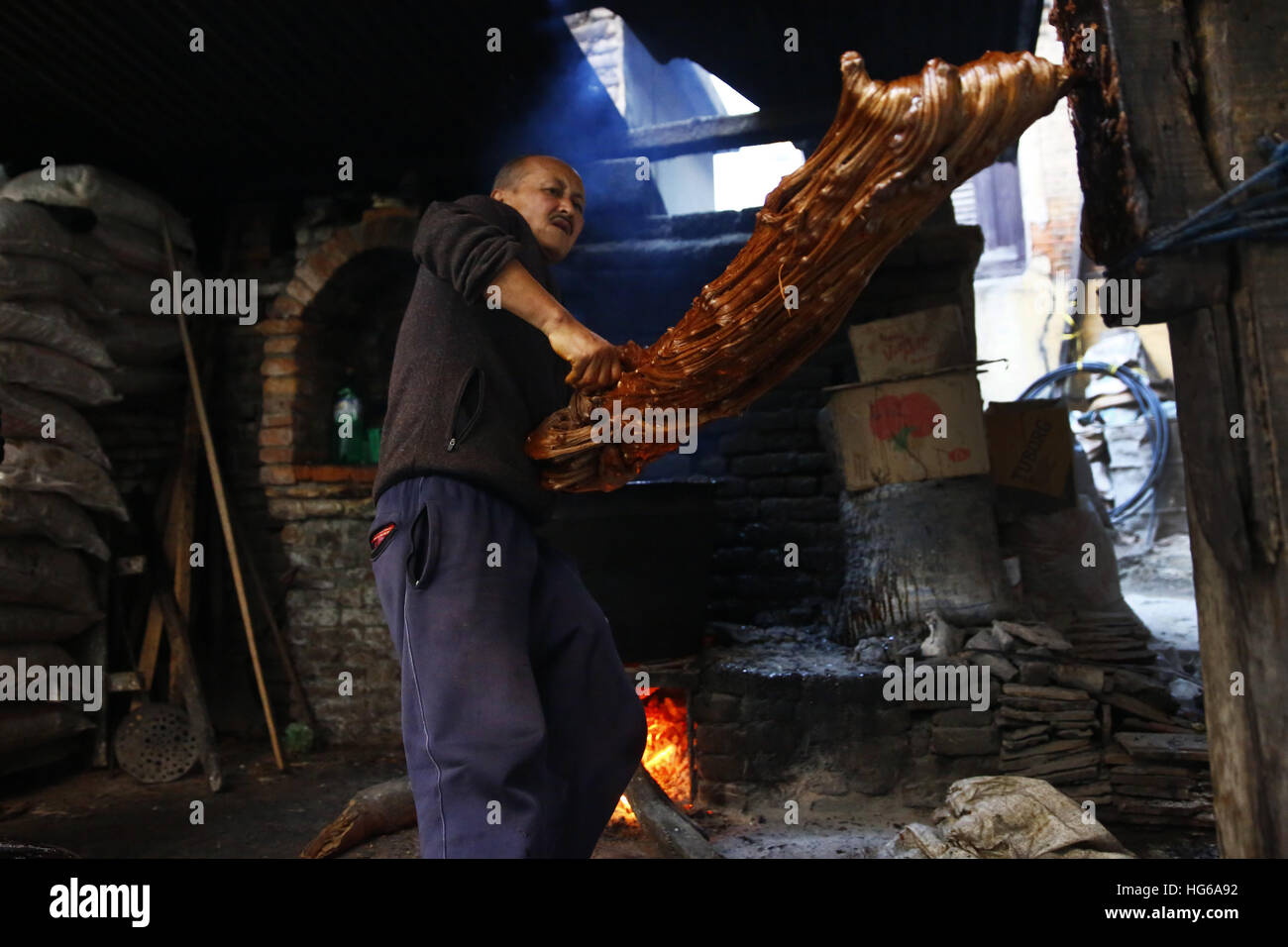Lalitpur, Nepal. 4th Jan, 2017. A Nepalese man flogs hardboiled ...