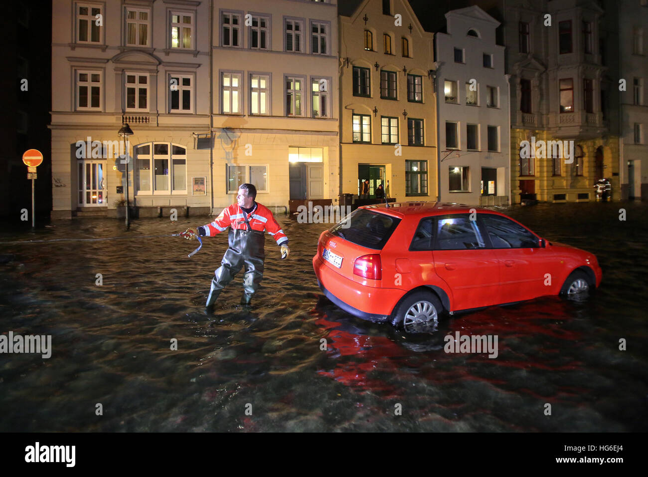 Luebeck, Germany. 04th Jan, 2017. A car in a flooded street in Luebeck ...