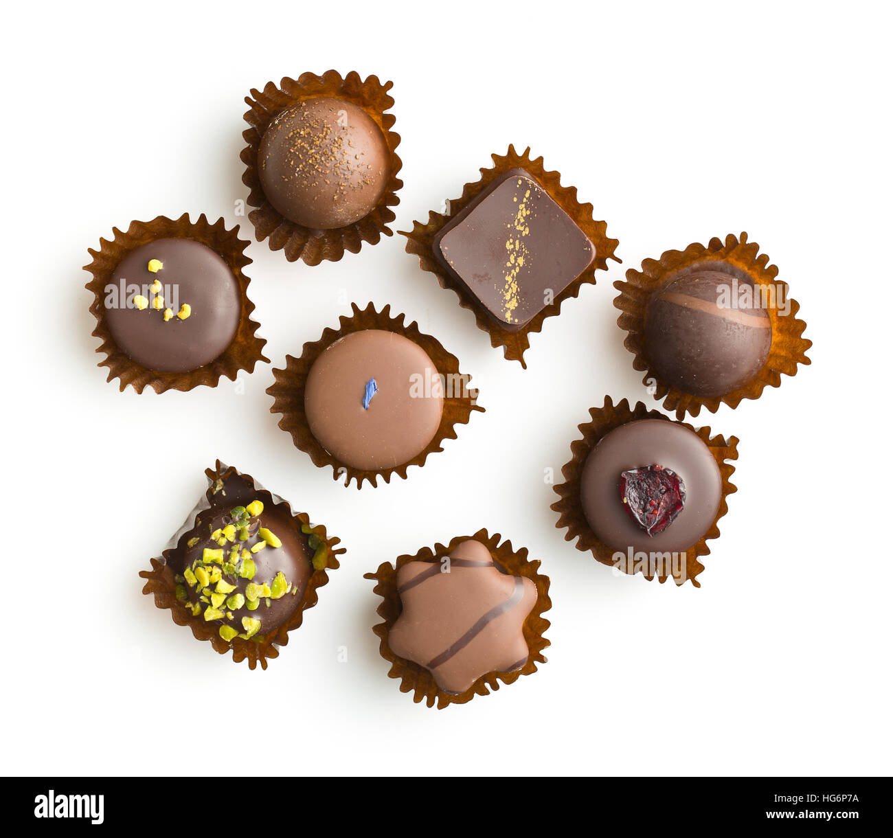 Various chocolate pralines isolated on white background. Top view Stock ...