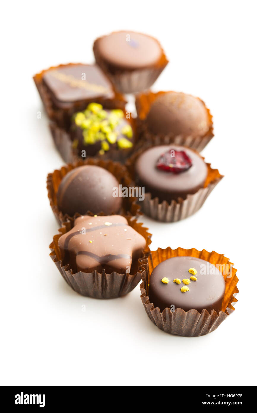 Various chocolate pralines isolated on white background Stock Photo - Alamy