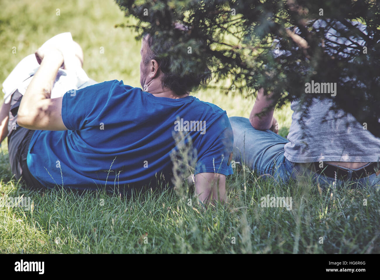 Sit under tree old man hi-res stock photography and images - Alamy