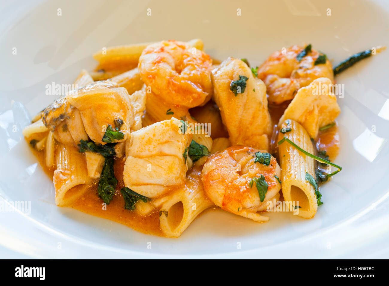 Seafood with macaroni, shrimps, fish and penne Stock Photo - Alamy