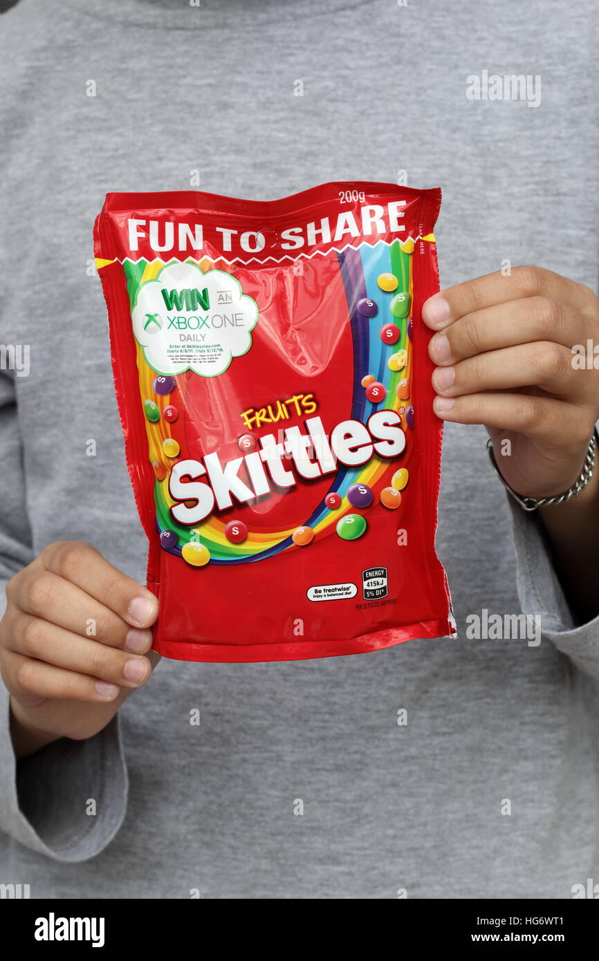 Australian Skittles in red pack isolated Stock Photo - Alamy