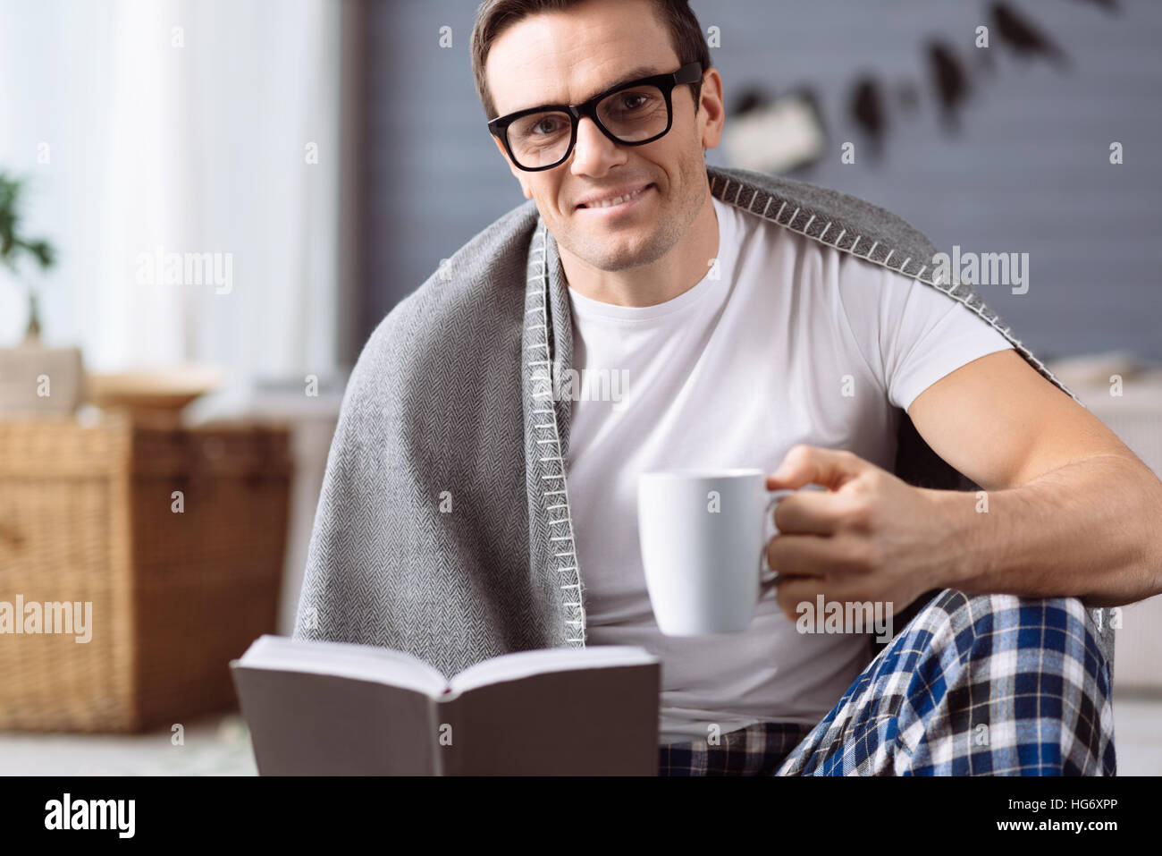 Positive happy man resting at home Stock Photo - Alamy