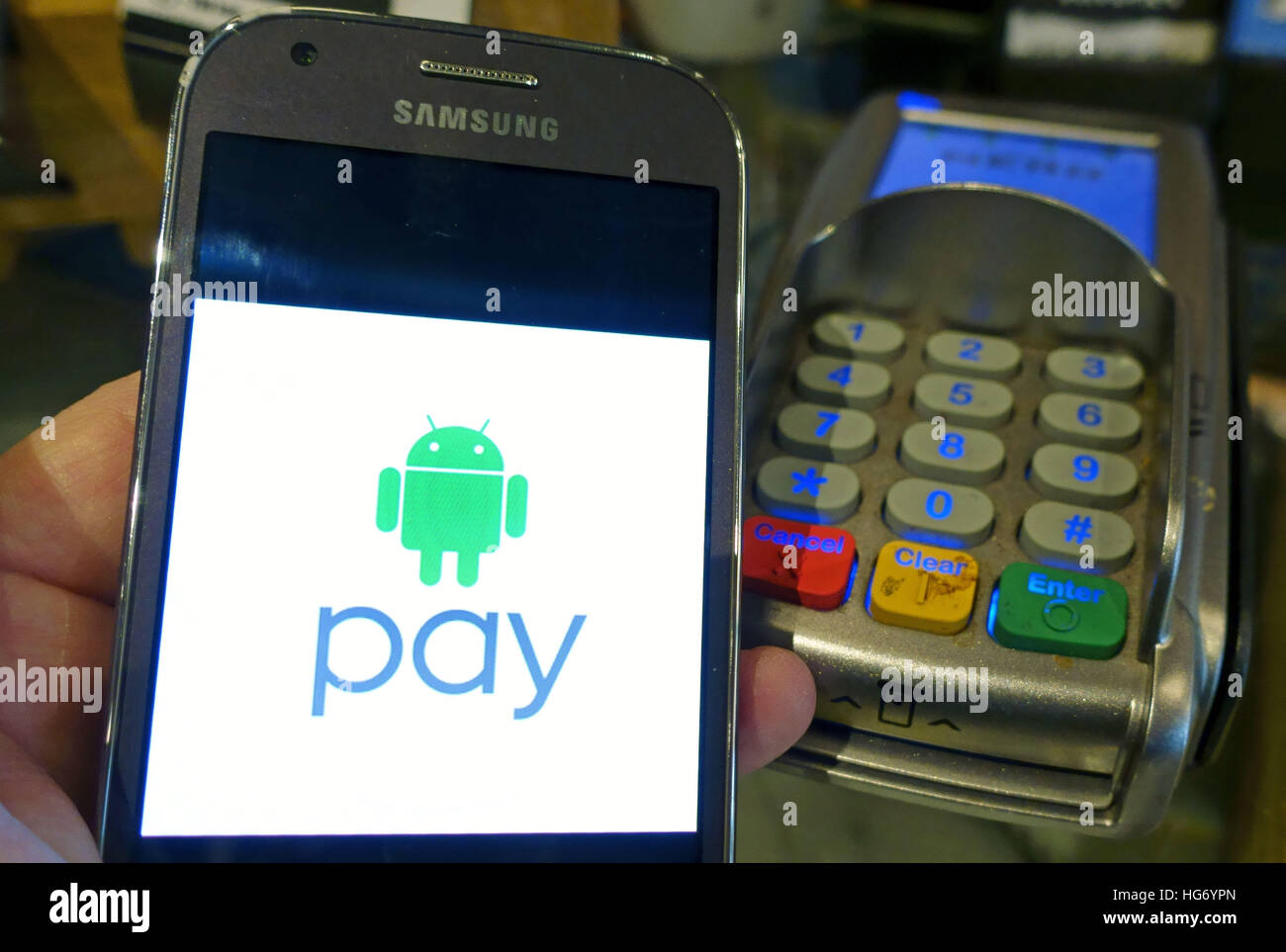 Android Pay payment app on a smartphone, London Stock Photo - Alamy