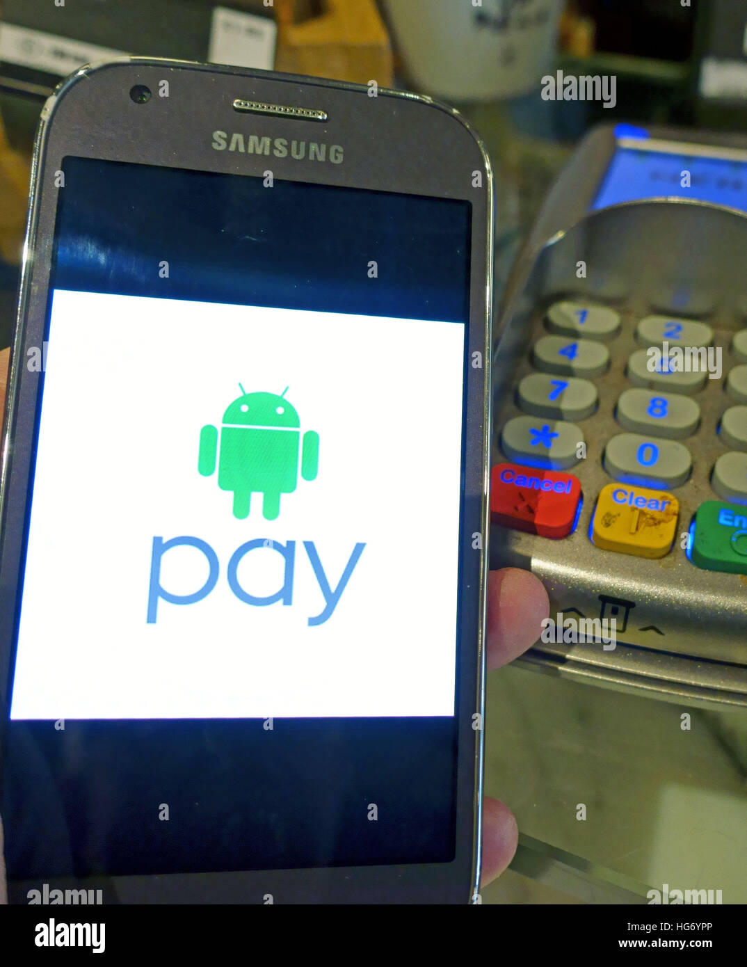 Android Pay payment app on a smartphone, London Stock Photo - Alamy