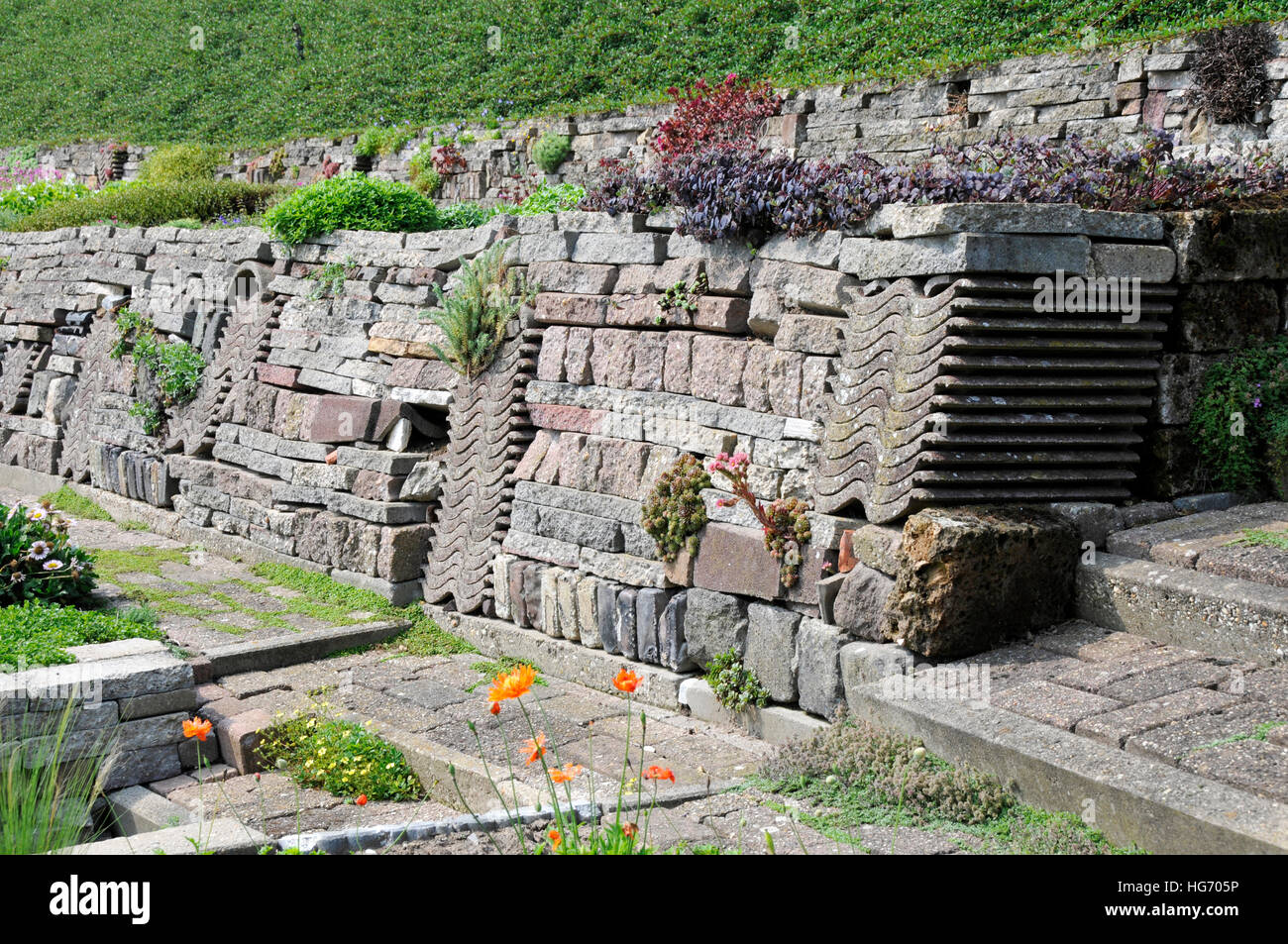 Rock garden made from recycling material Stock Photo - Alamy
