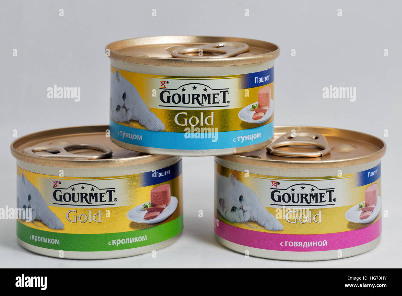 Purina Gourmet Gold luxury pet food cans on white background. Formed in ...