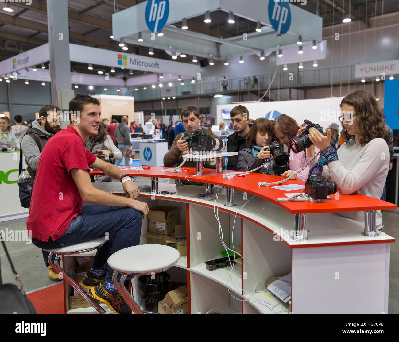 Unrecognized visitors testing professional photographic cameras on ...