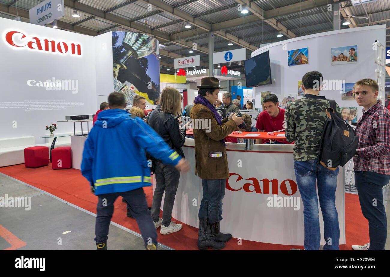 Unrecognized visitors testing professional photographic cameras on ...