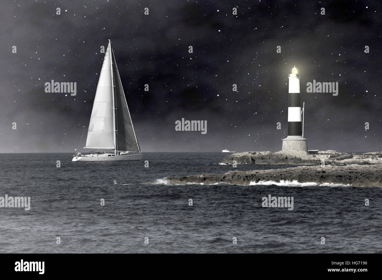 A lighthouse guides the sailboat in the night Stock Photo - Alamy