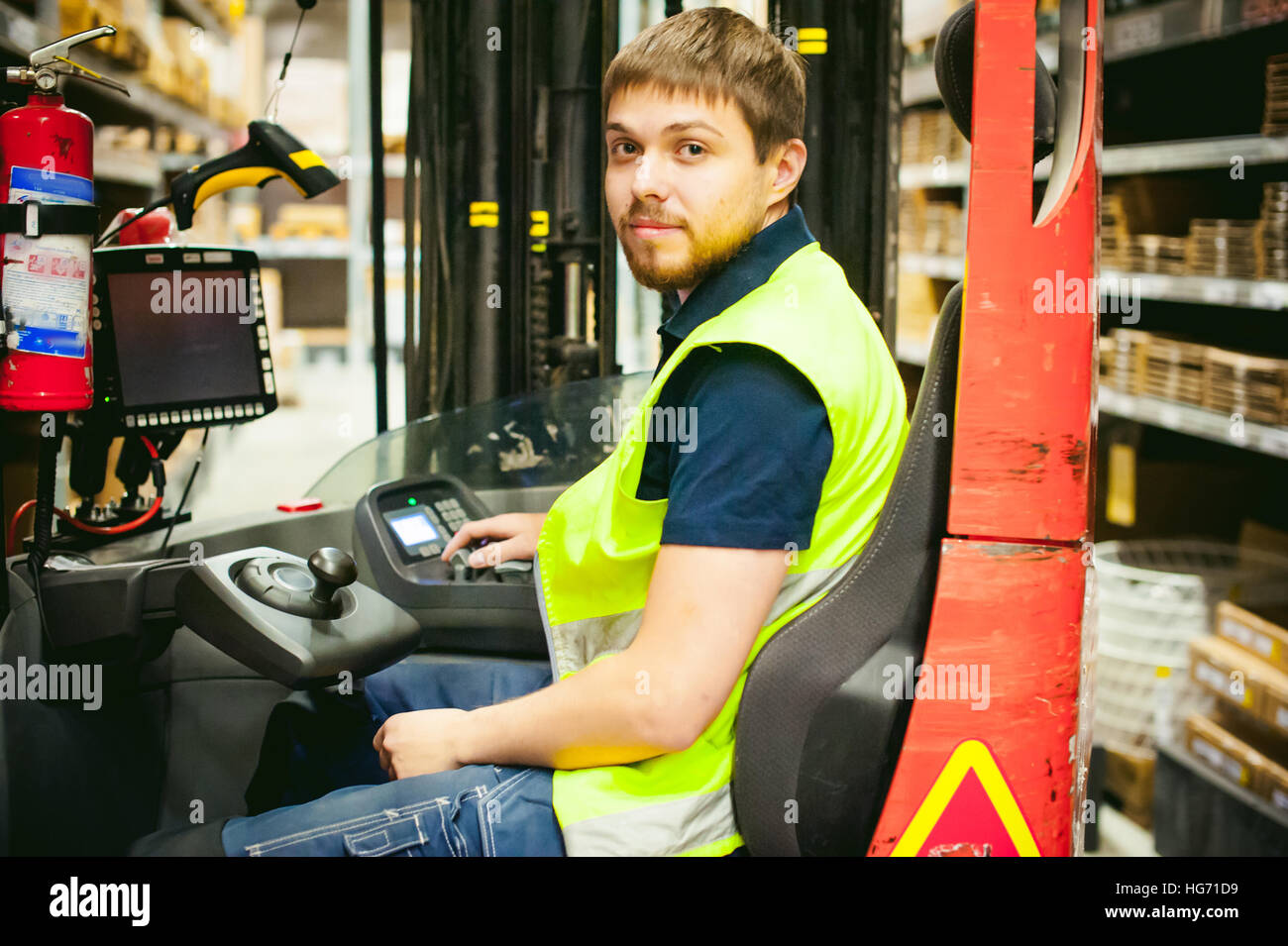 man driver Reachtruck busy working logistics warehouse store Stock ...
