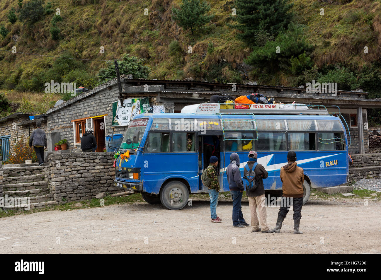 Jomsom, Nepal - October 19: People having a rest from bus ride, on ...