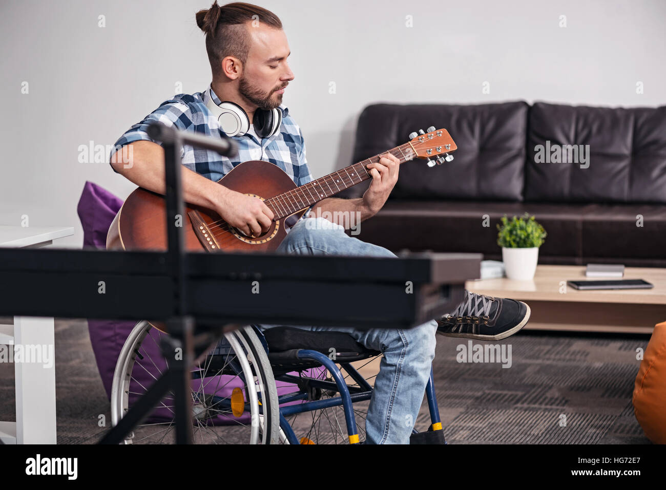 Talented handicapped man playing songs Stock Photo - Alamy