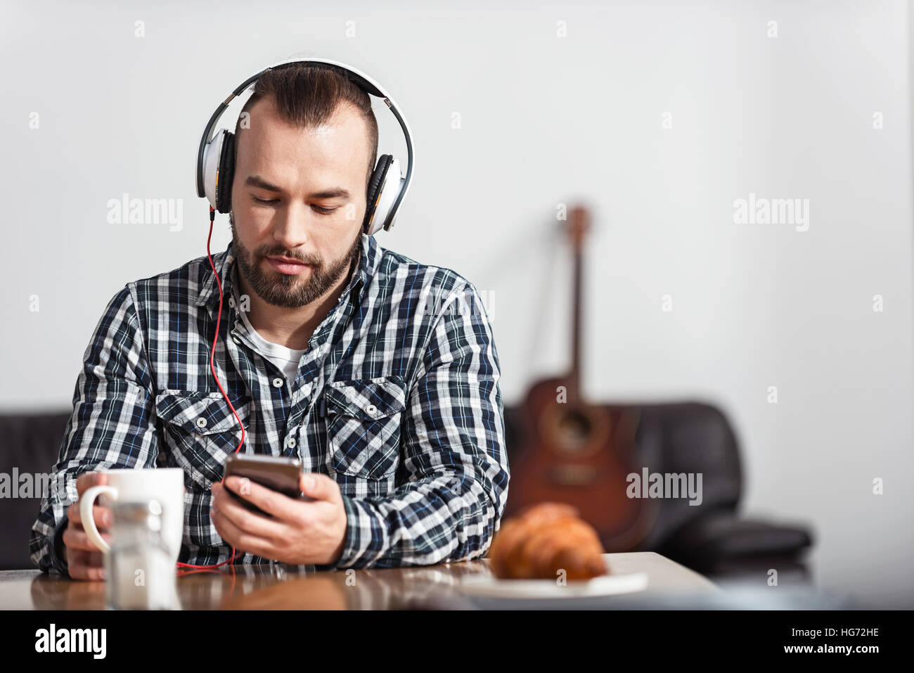 Handsome musician having a break Stock Photo - Alamy