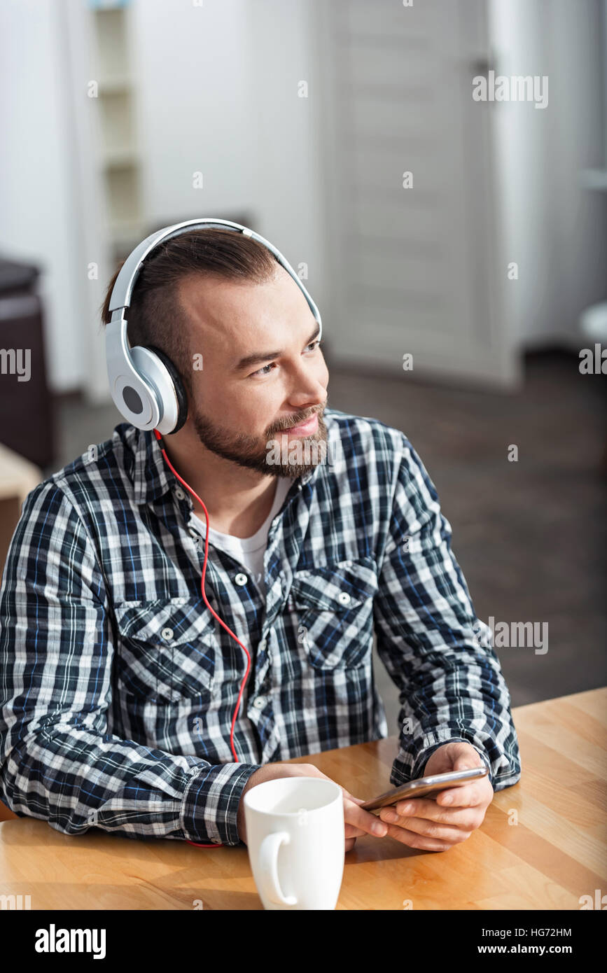 Inspired young man enjoying music Stock Photo - Alamy