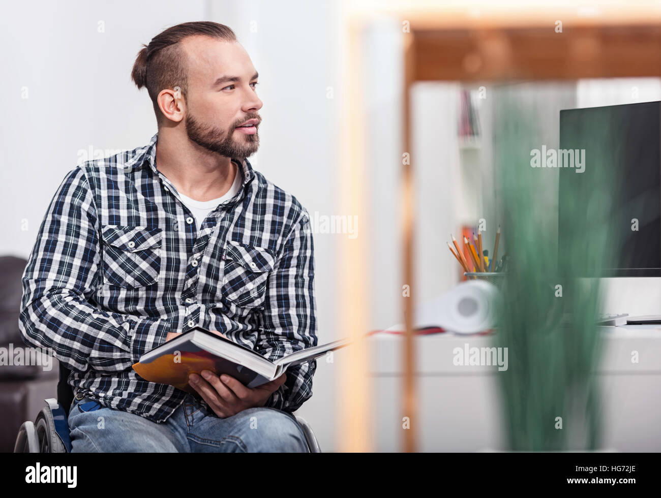 Intelligent young man thinking about something Stock Photo - Alamy