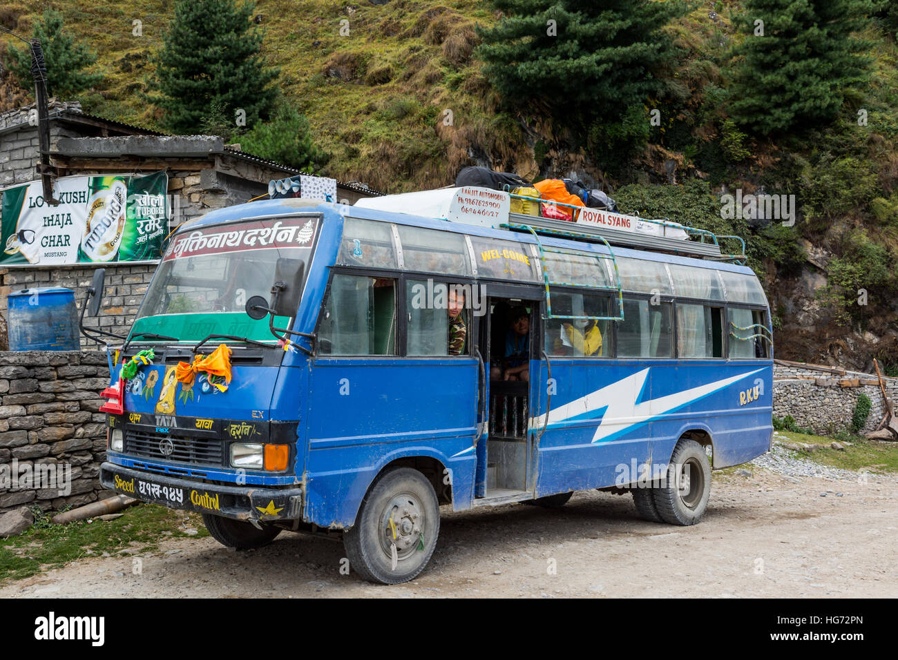 Jomsom, Nepal - October 19: People having a rest from bus ride, on ...