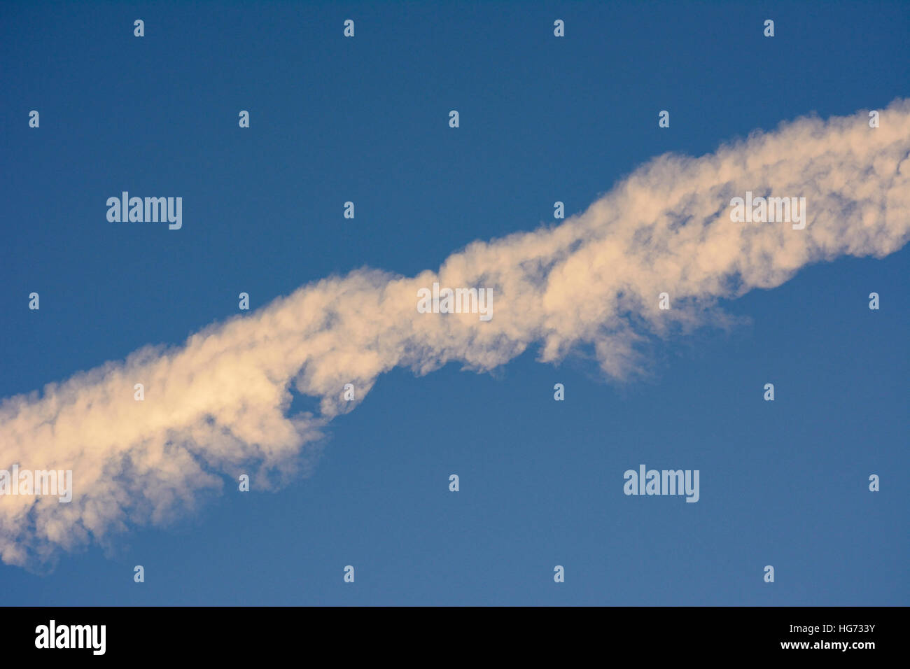 vapor trails or chemtrails from jets in sky Stock Photo - Alamy